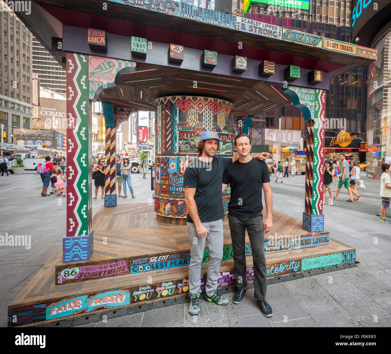 Artists Patrick Miller, right, and Patrick McNeil, left, pose in front ...