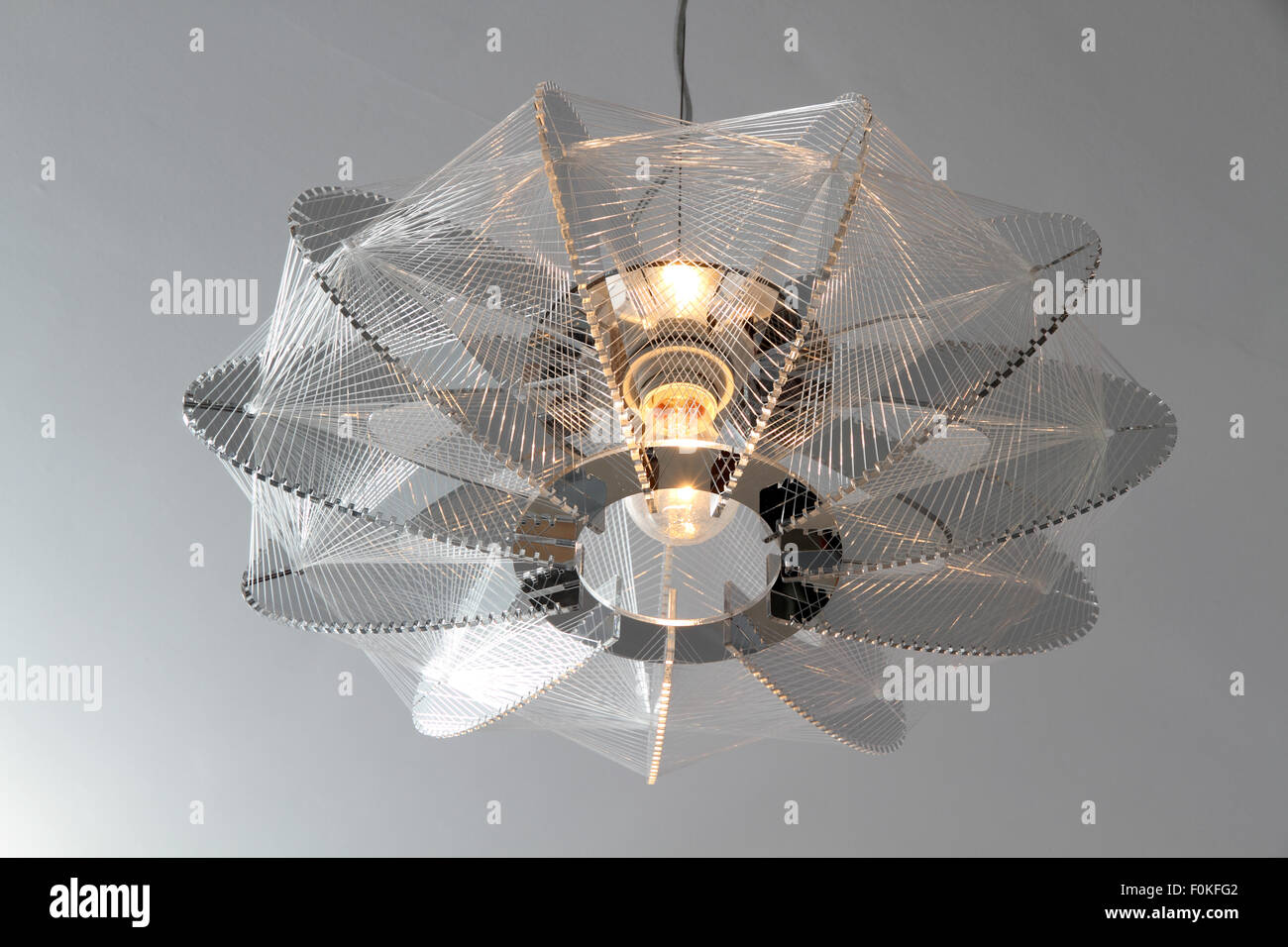 Intricate modern lamp shade Stock Photo - Alamy