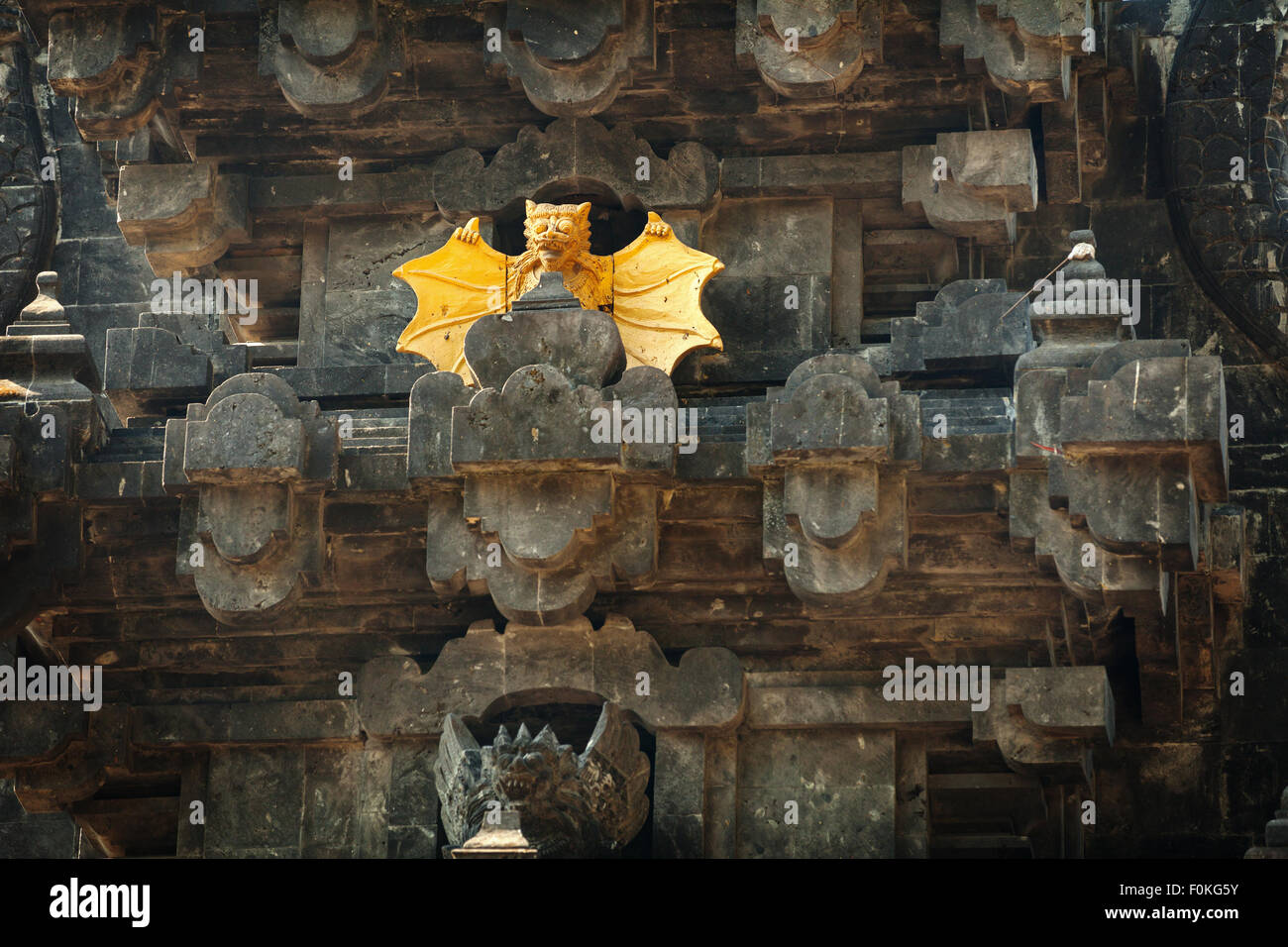 Intricately carved facade of Goa Lawah Bat Cave Temple, including ...