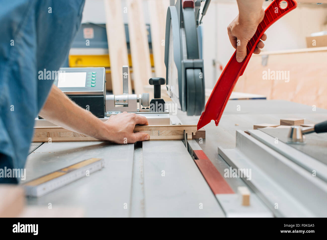 Carpenter working in workshop Stock Photo - Alamy