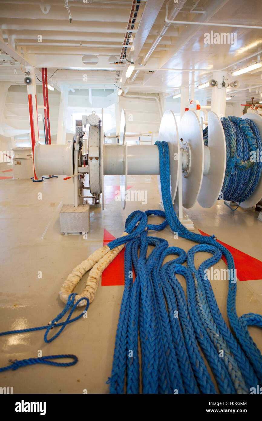Inside a modern cruise liner Mooring deck with mooring lines ropes on ...