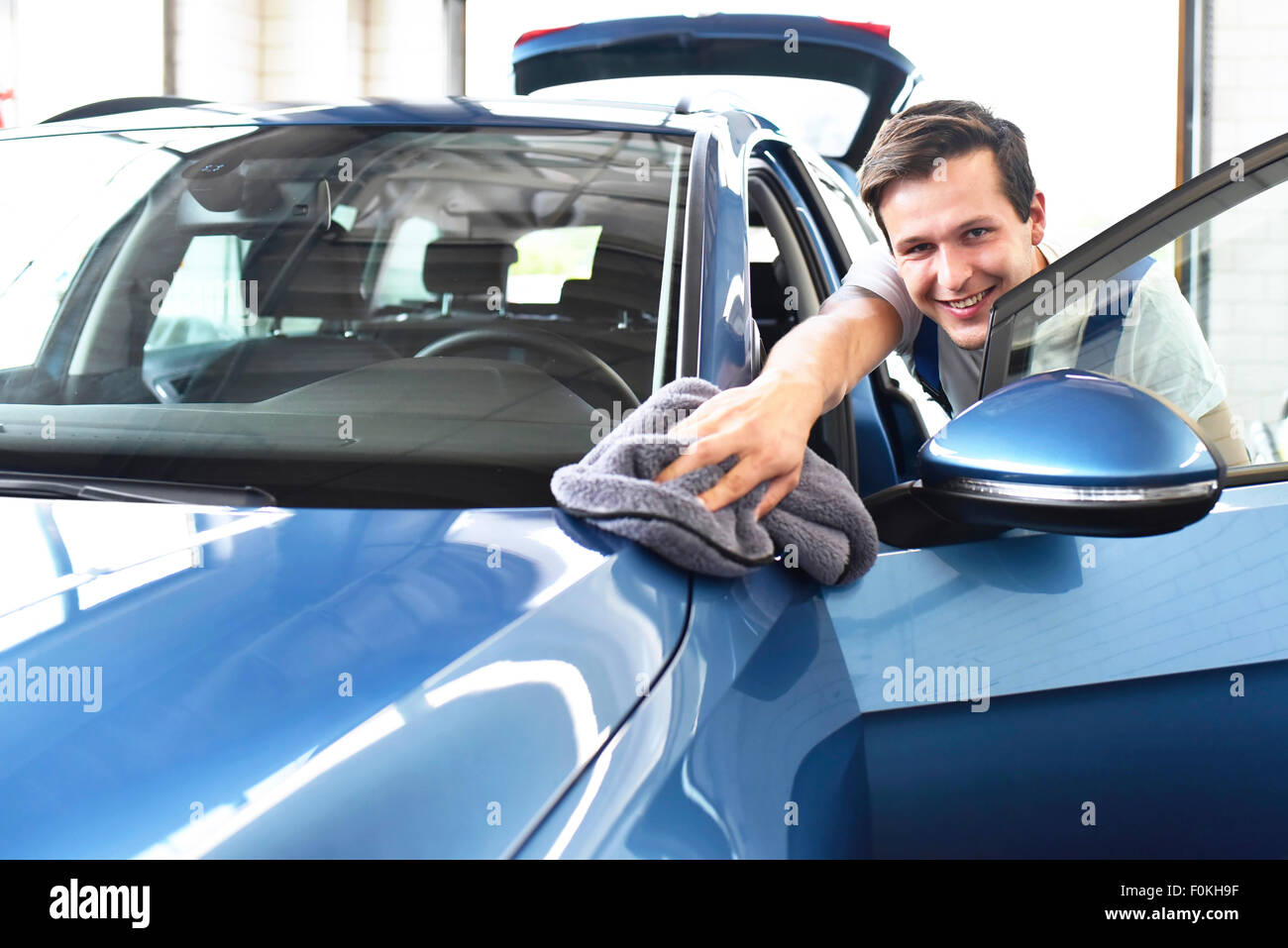 Man polishing car Stock Photo - Alamy