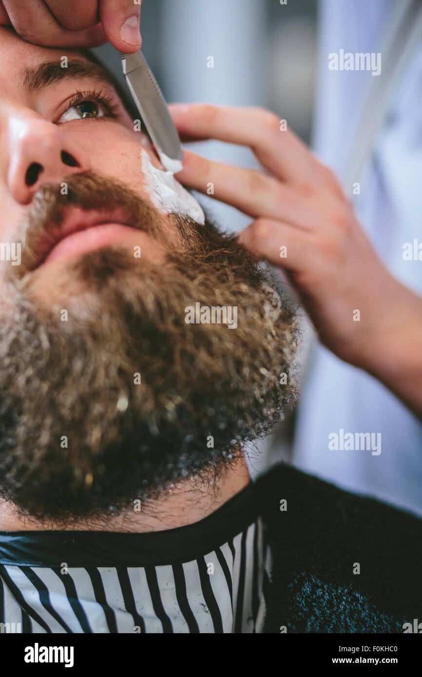 Shave with a straight razor hi-res stock photography and images - Alamy