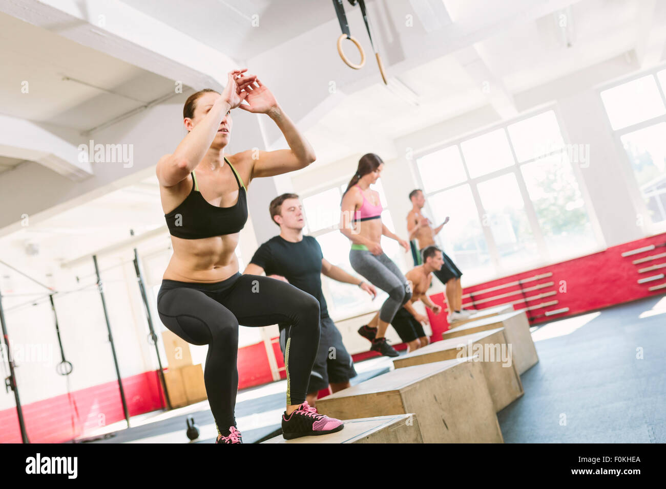 Young athletes box jumping hi-res stock photography and images - Alamy