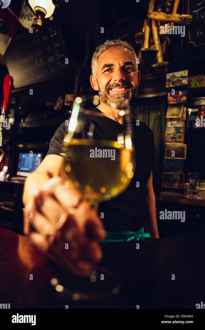 Man working in an Irish pub Stock Photo - Alamy