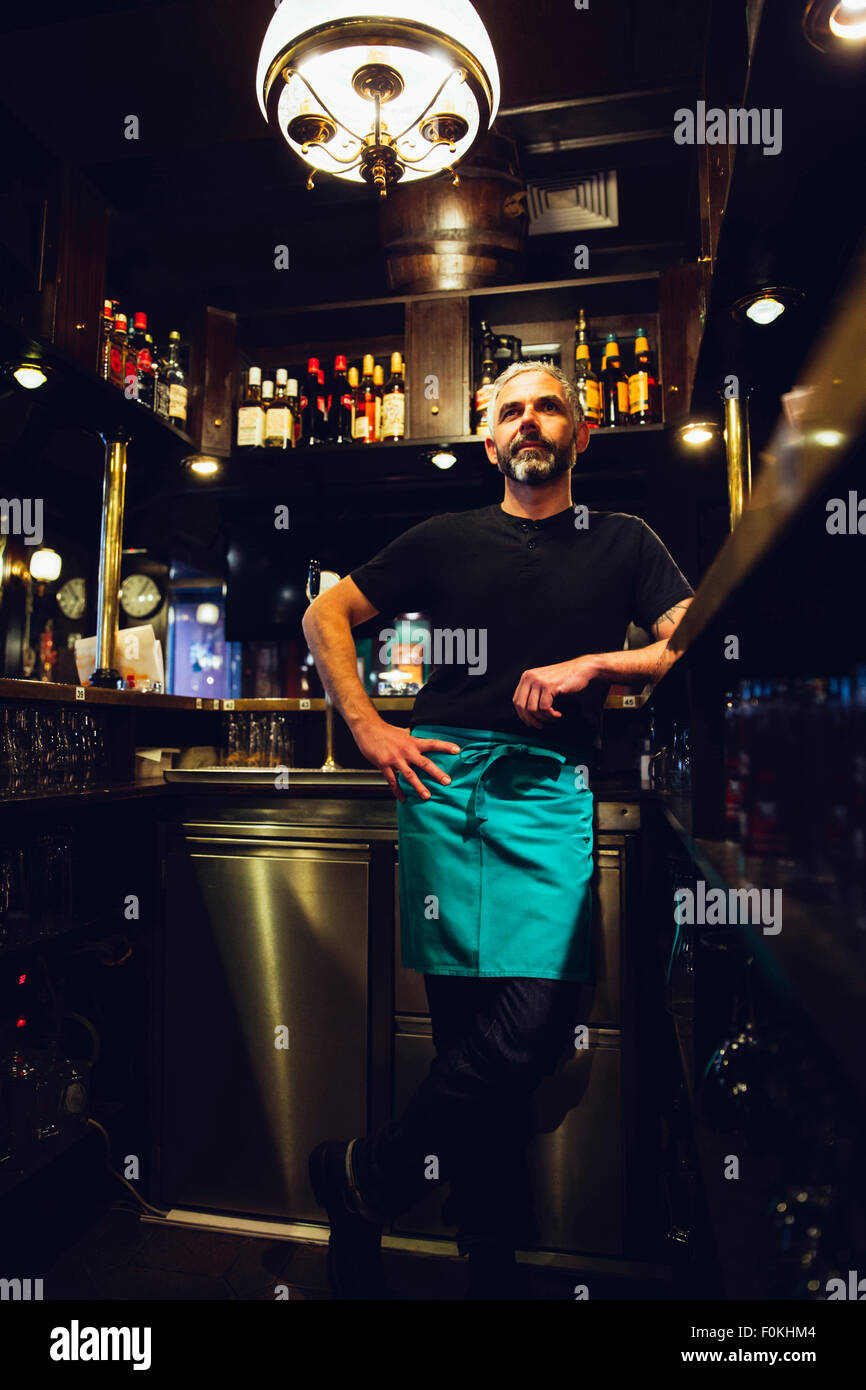 Waiter in an Irish pub Stock Photo - Alamy