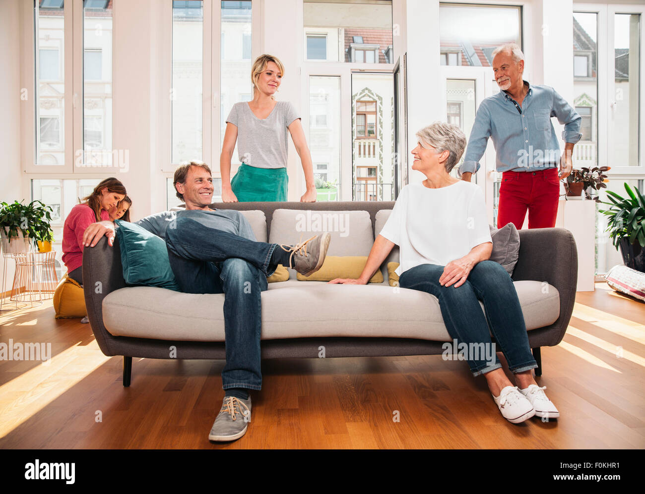 Three generations family at home Stock Photo - Alamy