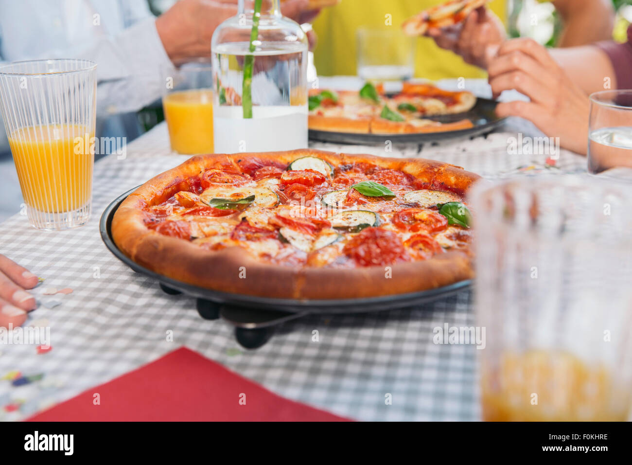 Homemade pizza on a table Stock Photo - Alamy