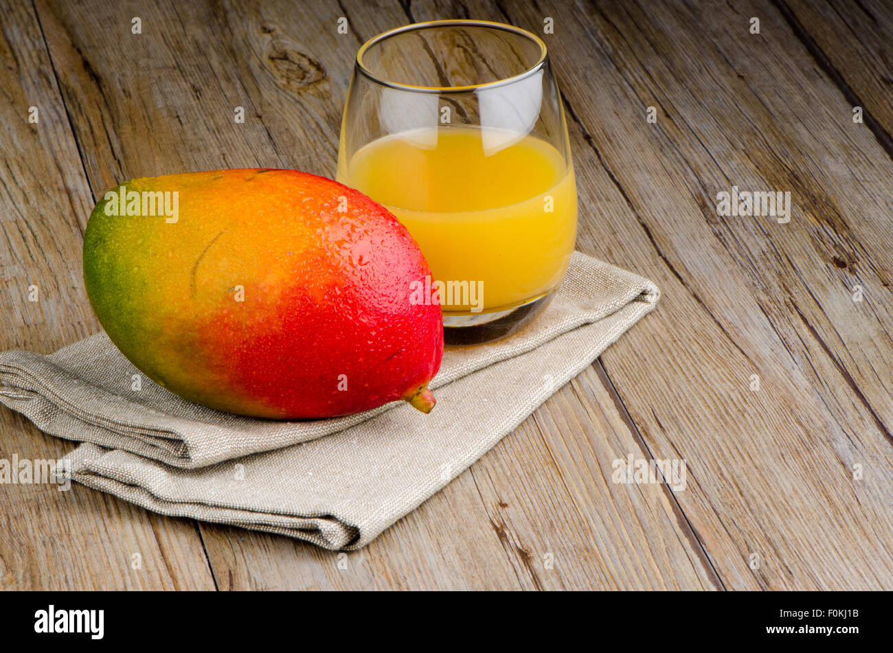 Fresh mango juice and mango fruit Stock Photo - Alamy