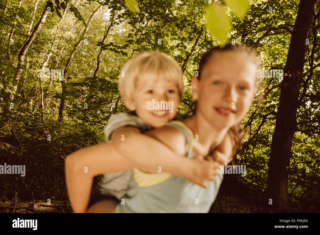 Piggy back 10 11 years hi-res stock photography and images - Alamy
