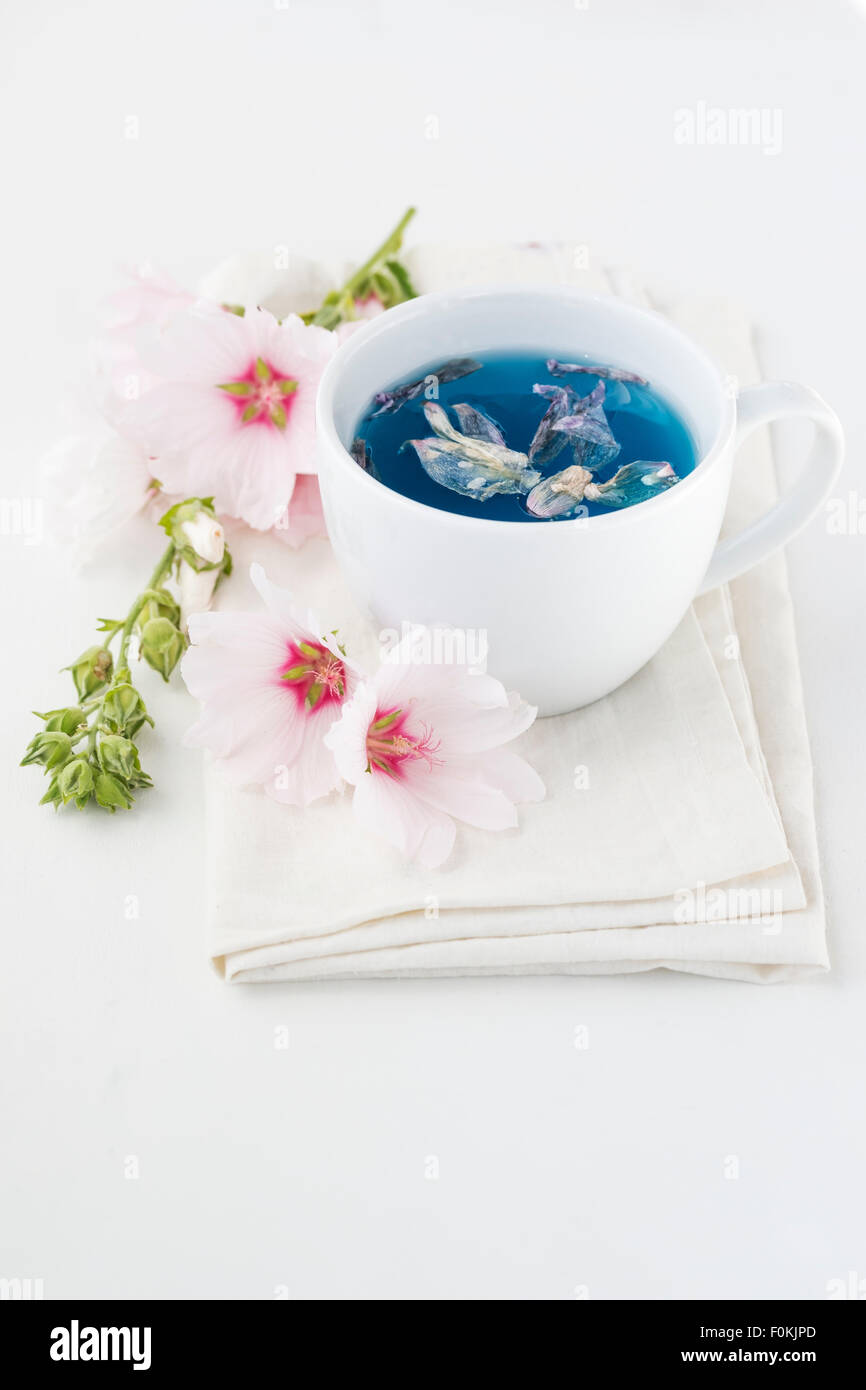 Cup of Mallow tea and blossoms Stock Photo - Alamy