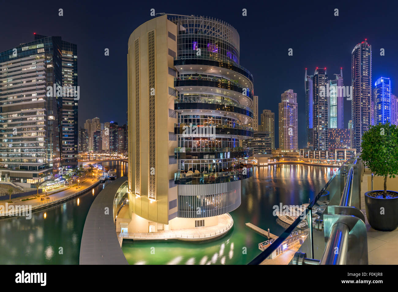 UAE, Dubai, view to the Pier 7 Building at Dubai Marina by night Stock ...