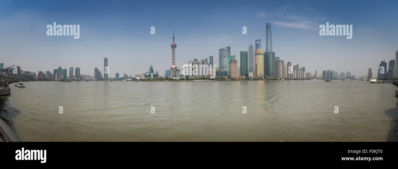 China, Shanghai, Panoramic view of Pudong skyline with Huangpu River ...