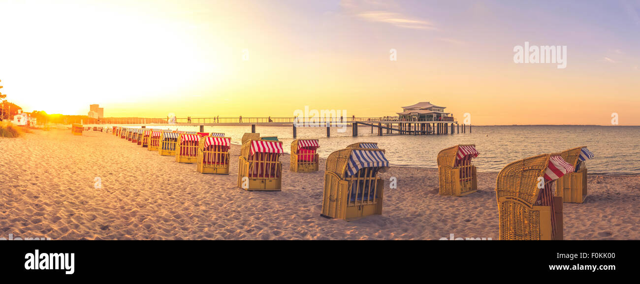 Germany, Niendorf, view to Timmendorfer Strand with hooded beach chairs ...