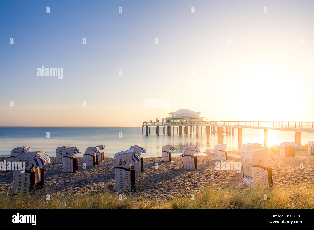 Germany, Niendorf, view to Timmendorfer Strand with hooded beach chairs ...