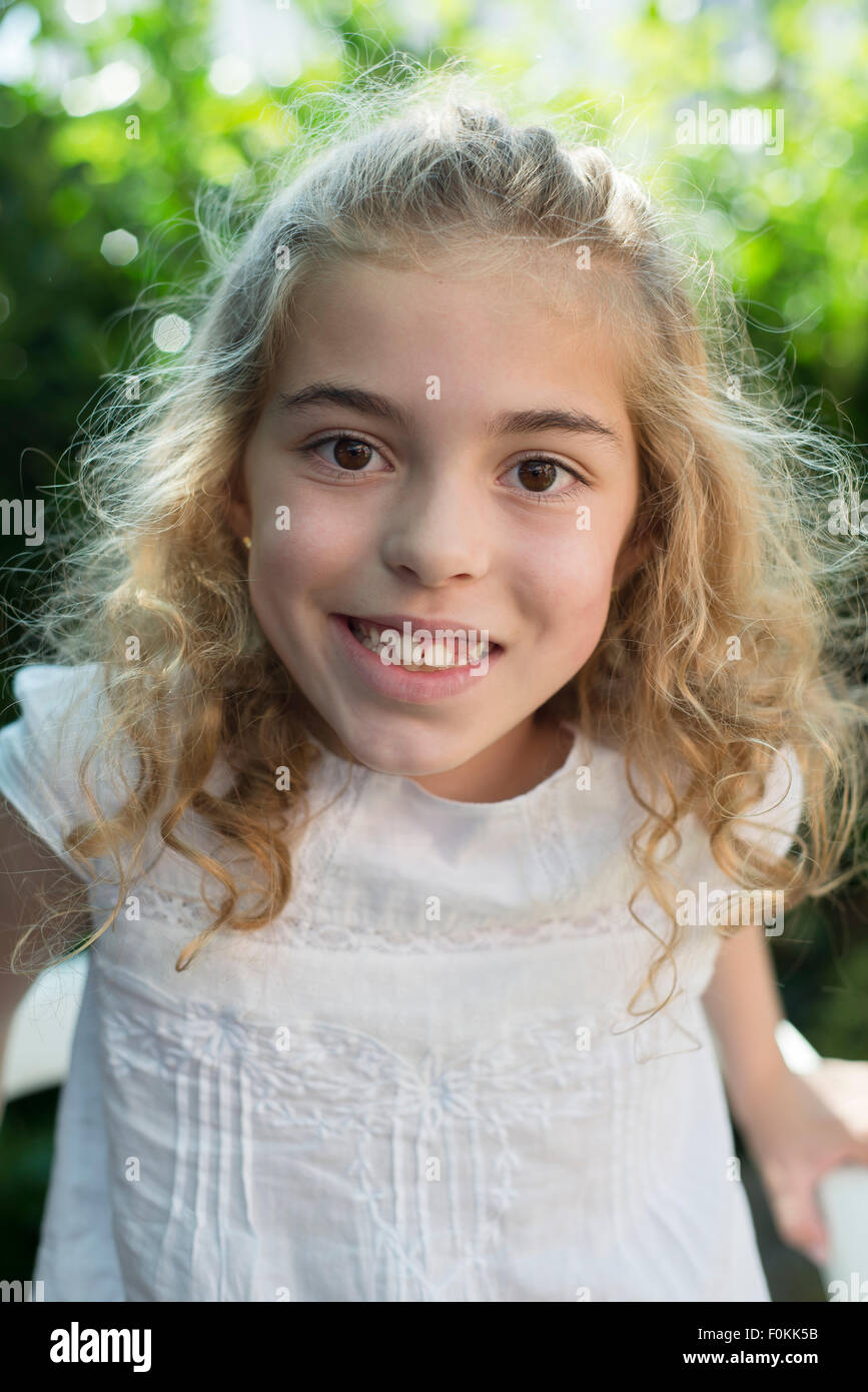 Portrait of smiling blond girl Stock Photo - Alamy