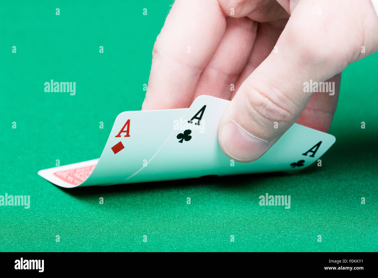 card player. Male hand with cards close-up Stock Photo - Alamy