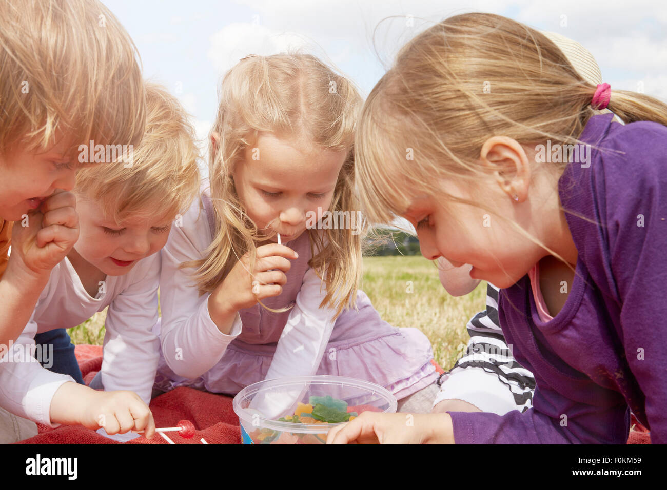 Children choosing sweets Stock Photo - Alamy