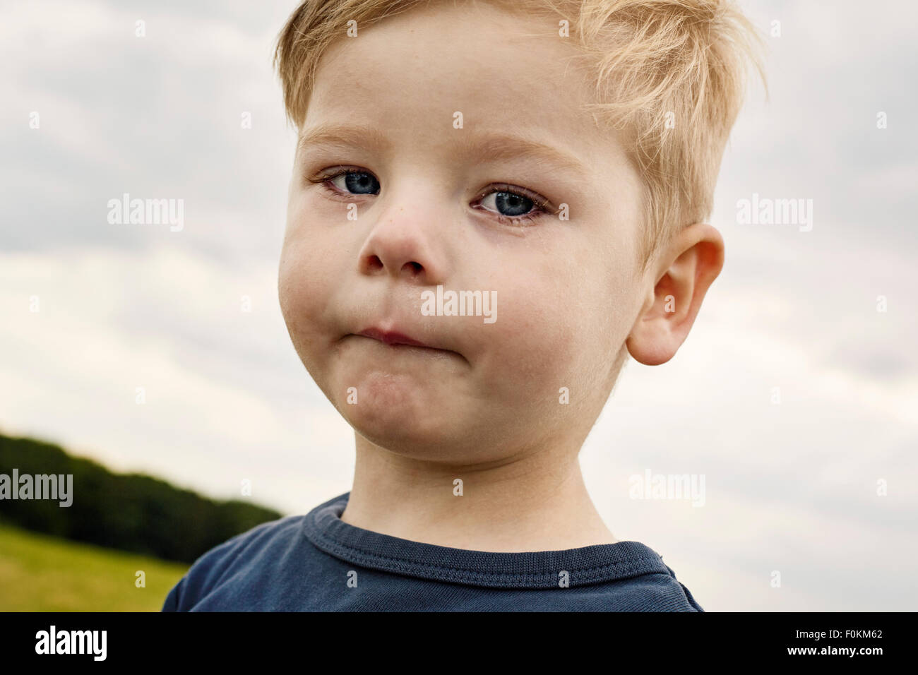 Little boy with tears in his eyes Stock Photo - Alamy