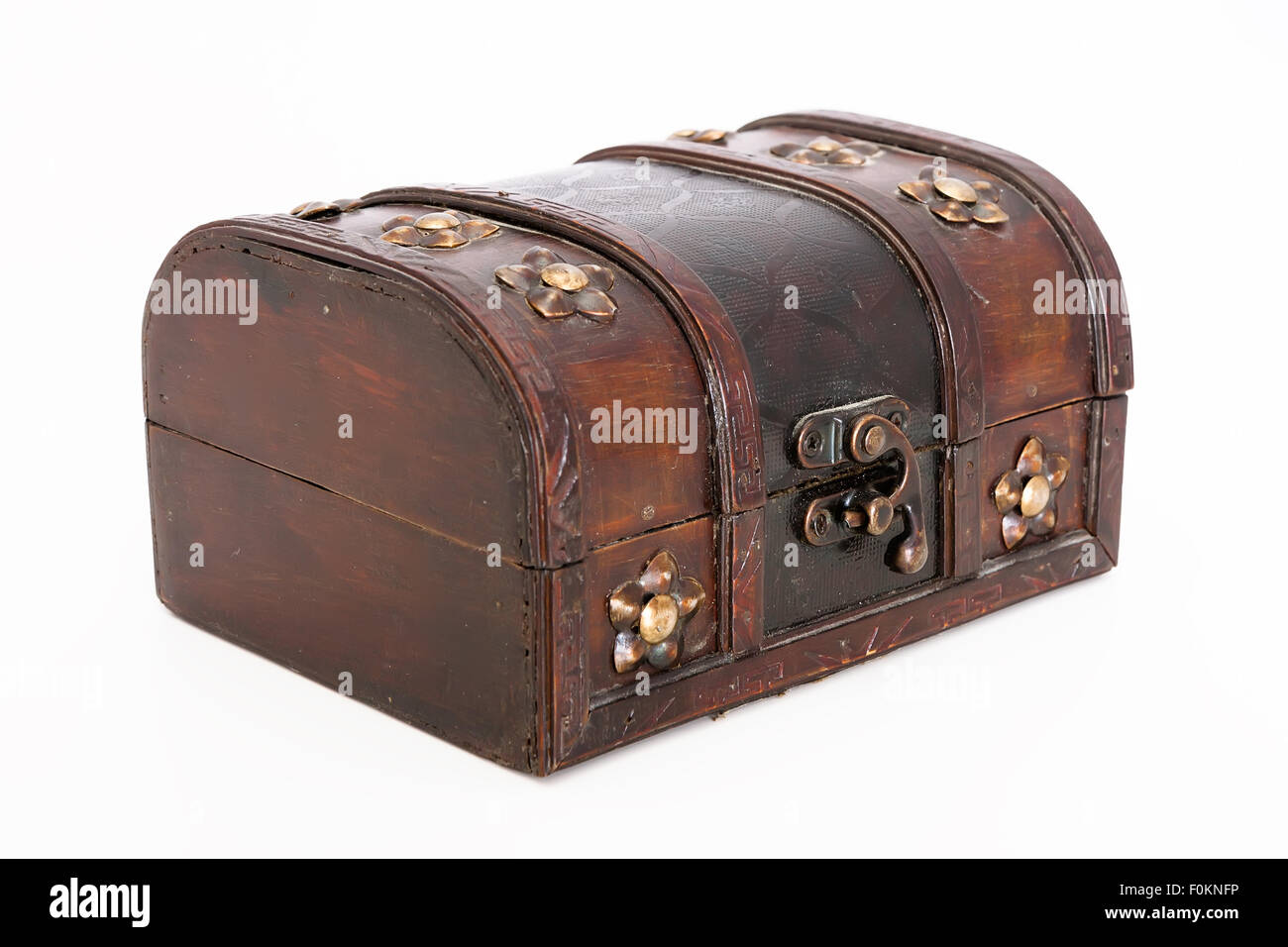 Closed chest on a light background. Wood with bronze Stock Photo - Alamy