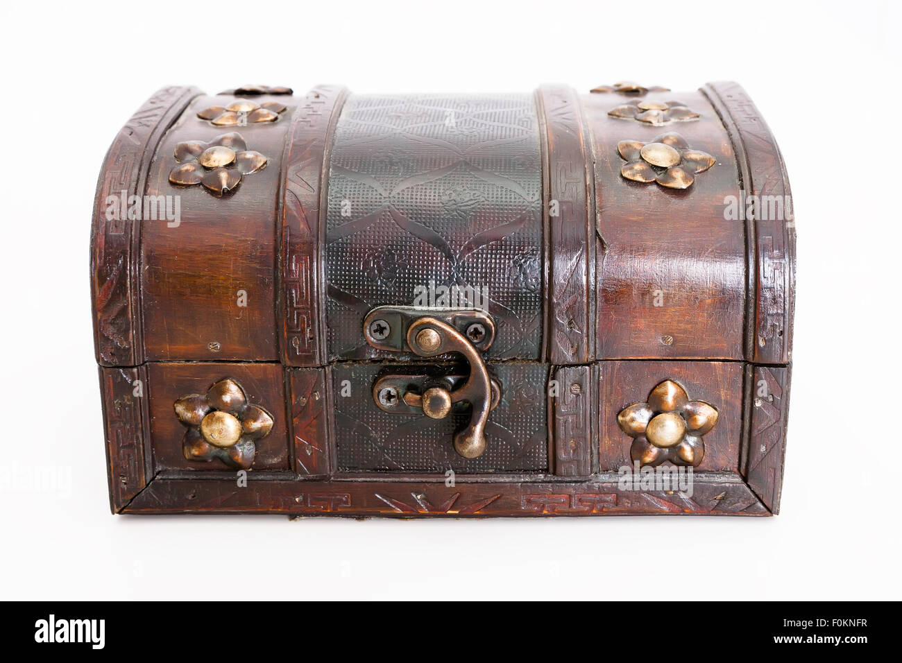Closed chest on a light background. Wood with bronze Stock Photo - Alamy