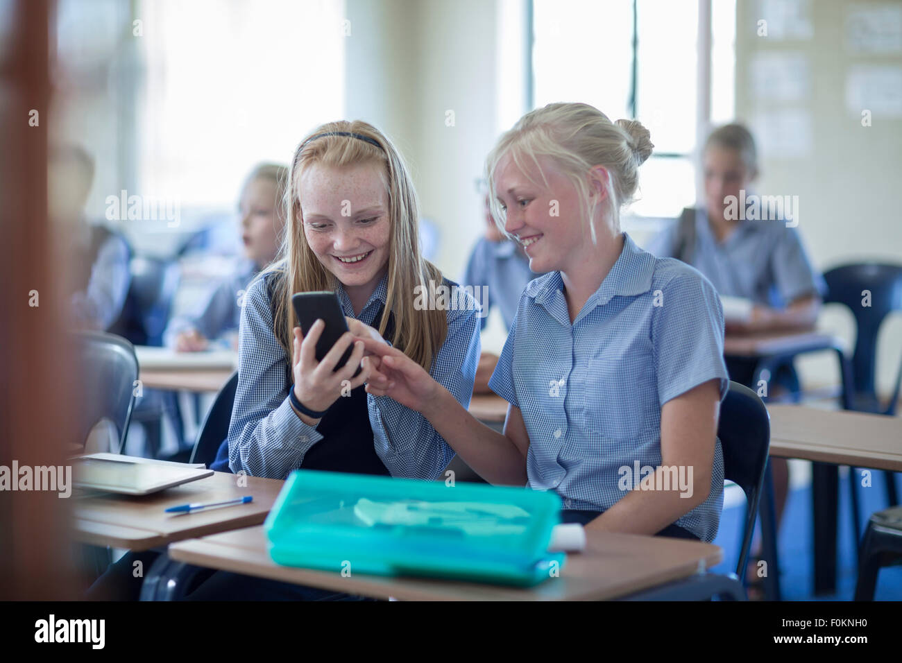Schoolgirls uniform phone hi-res stock photography and images - Alamy
