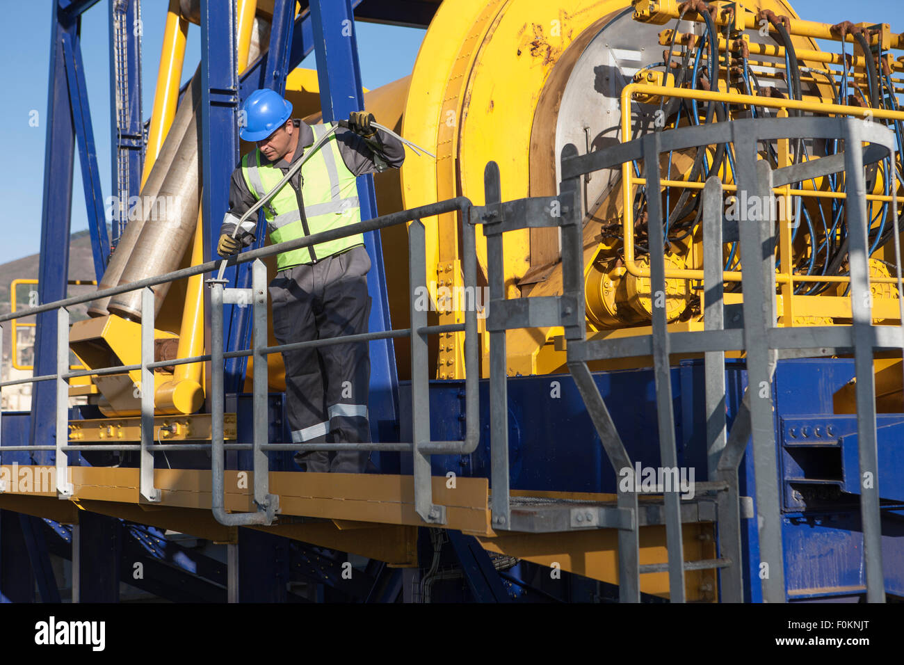 Man working onboard a ship Stock Photo - Alamy
