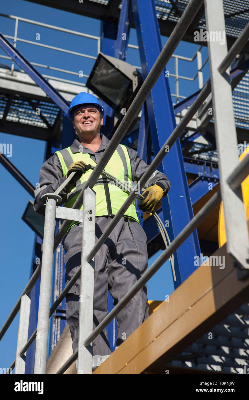 Man standing onboard a ship Stock Photo - Alamy