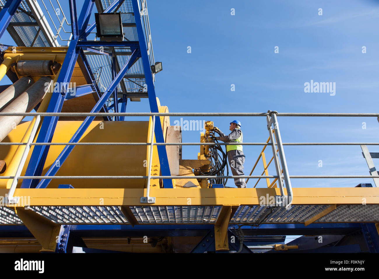 Man working onboard a ship Stock Photo - Alamy