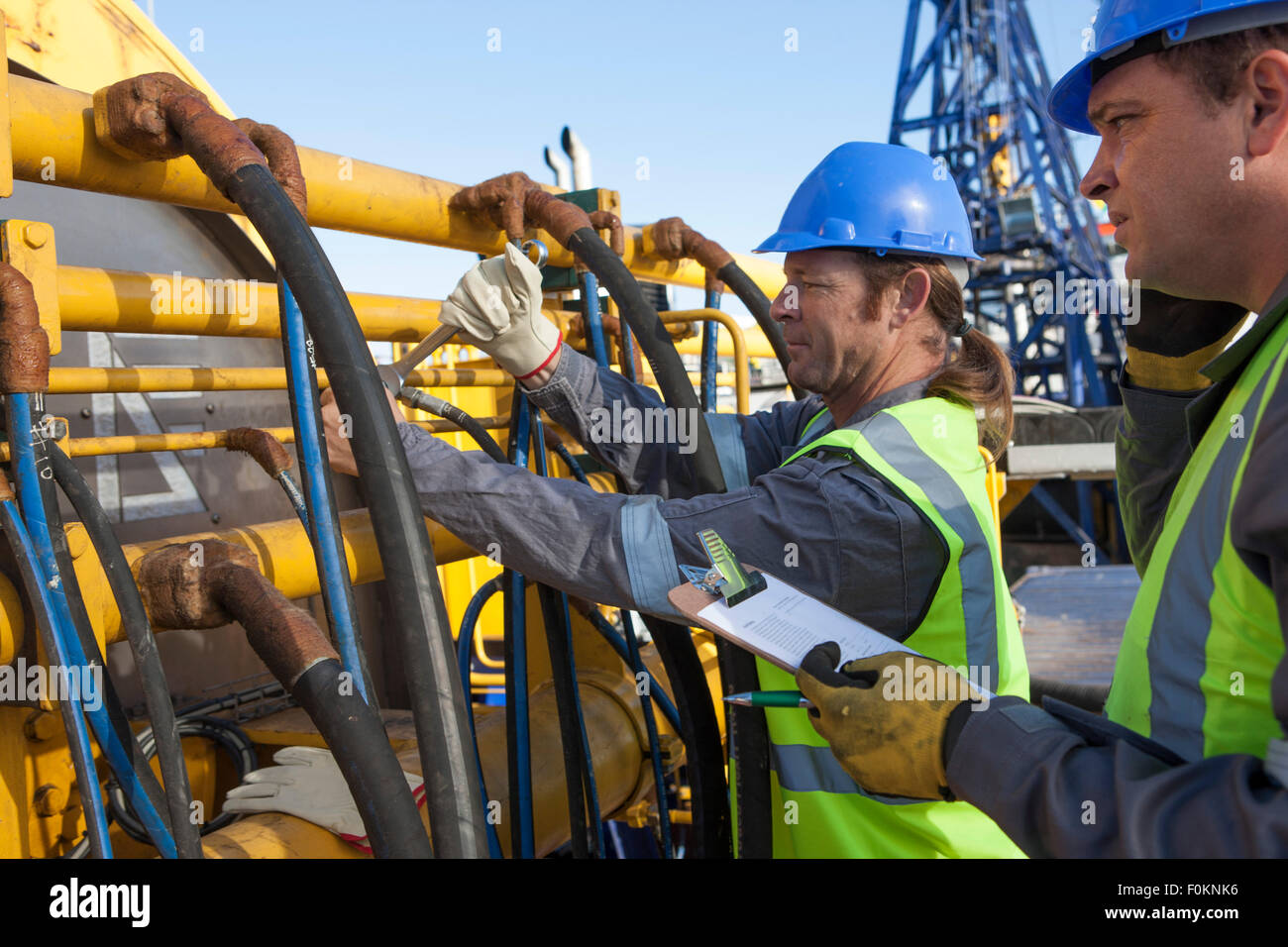 Crew working onboard a ship Stock Photo - Alamy