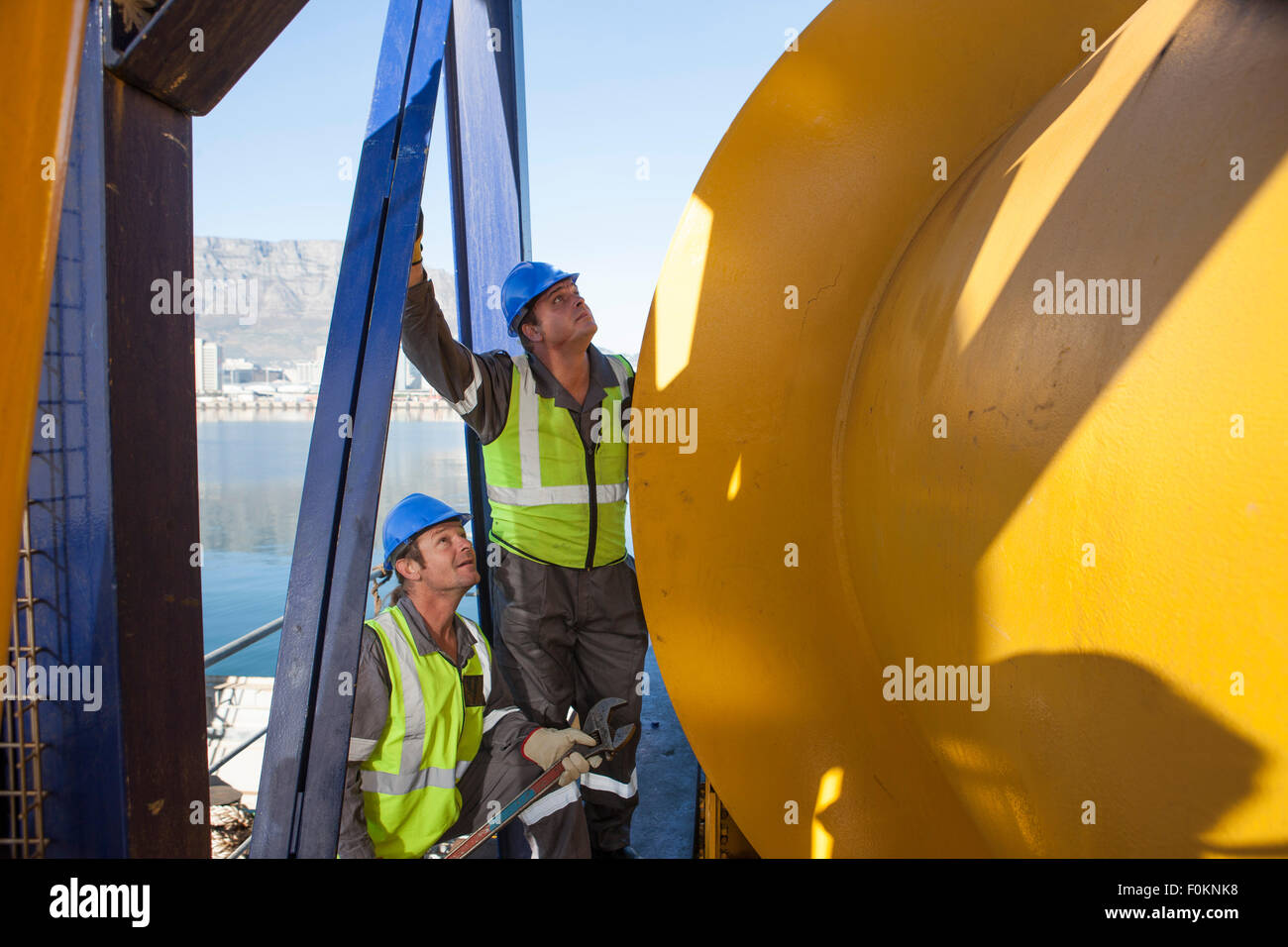 Crew working onboard a ship Stock Photo - Alamy