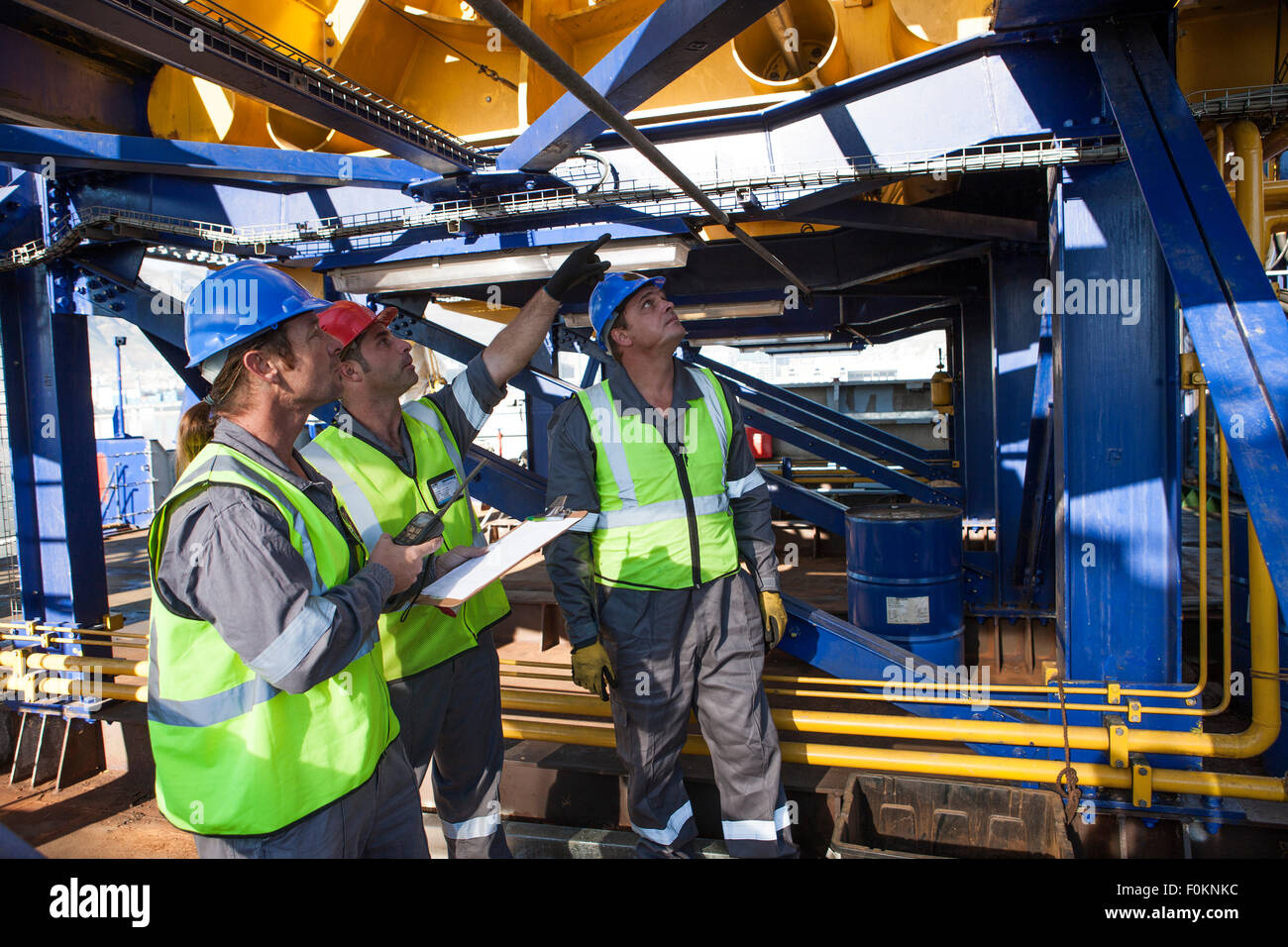 Crew onboard a ship inspecting with clipboard Stock Photo - Alamy
