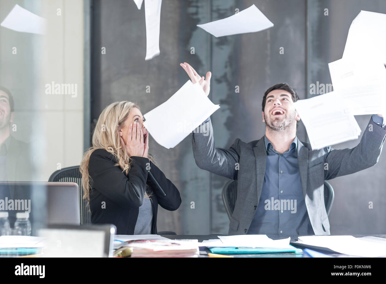 Throwing papers in the air hi-res stock photography and images - Alamy