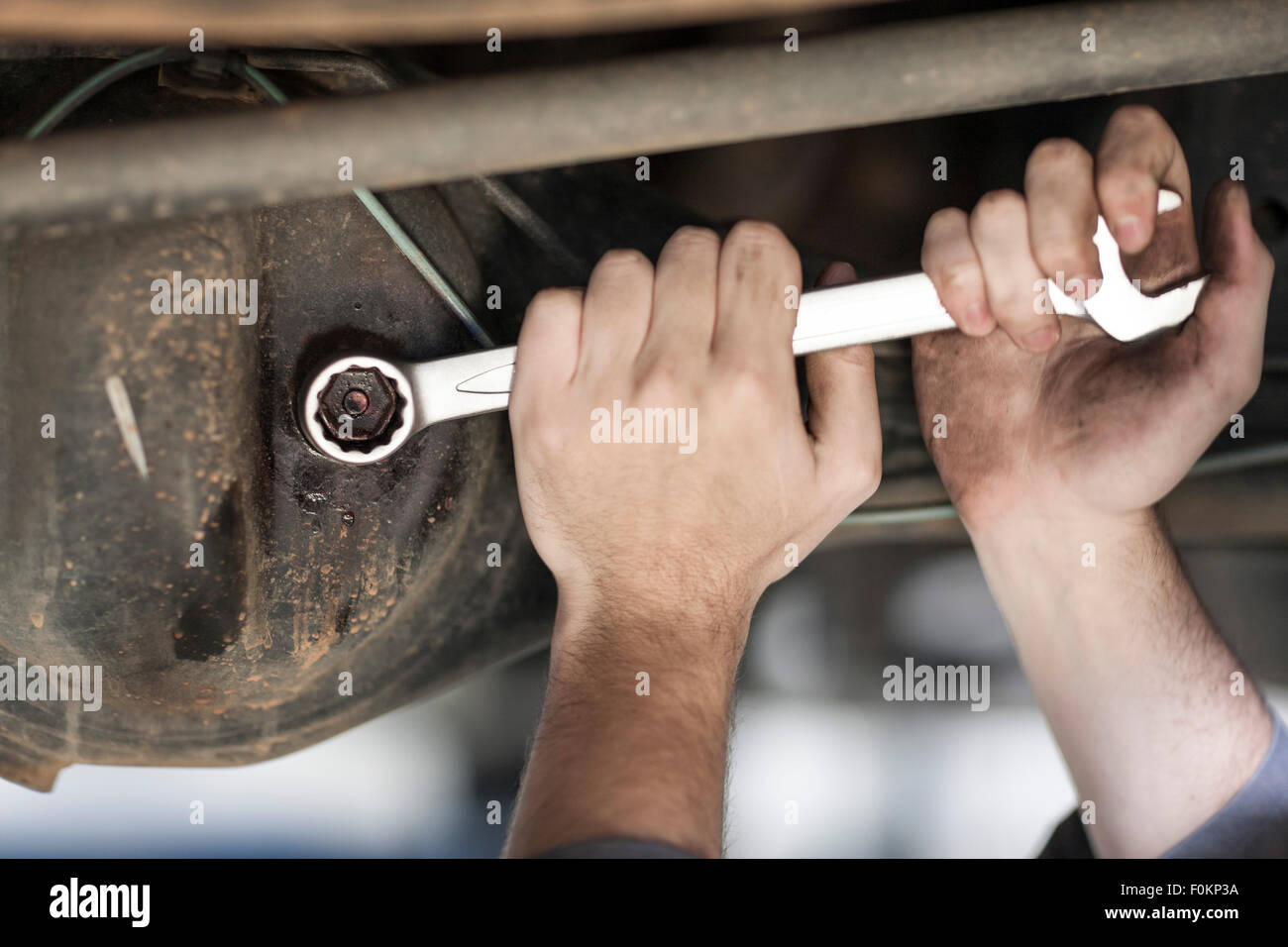 Close up car mechanic working screw hi-res stock photography and images ...