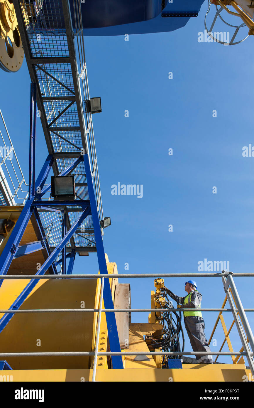 Man working onboard a ship Stock Photo - Alamy