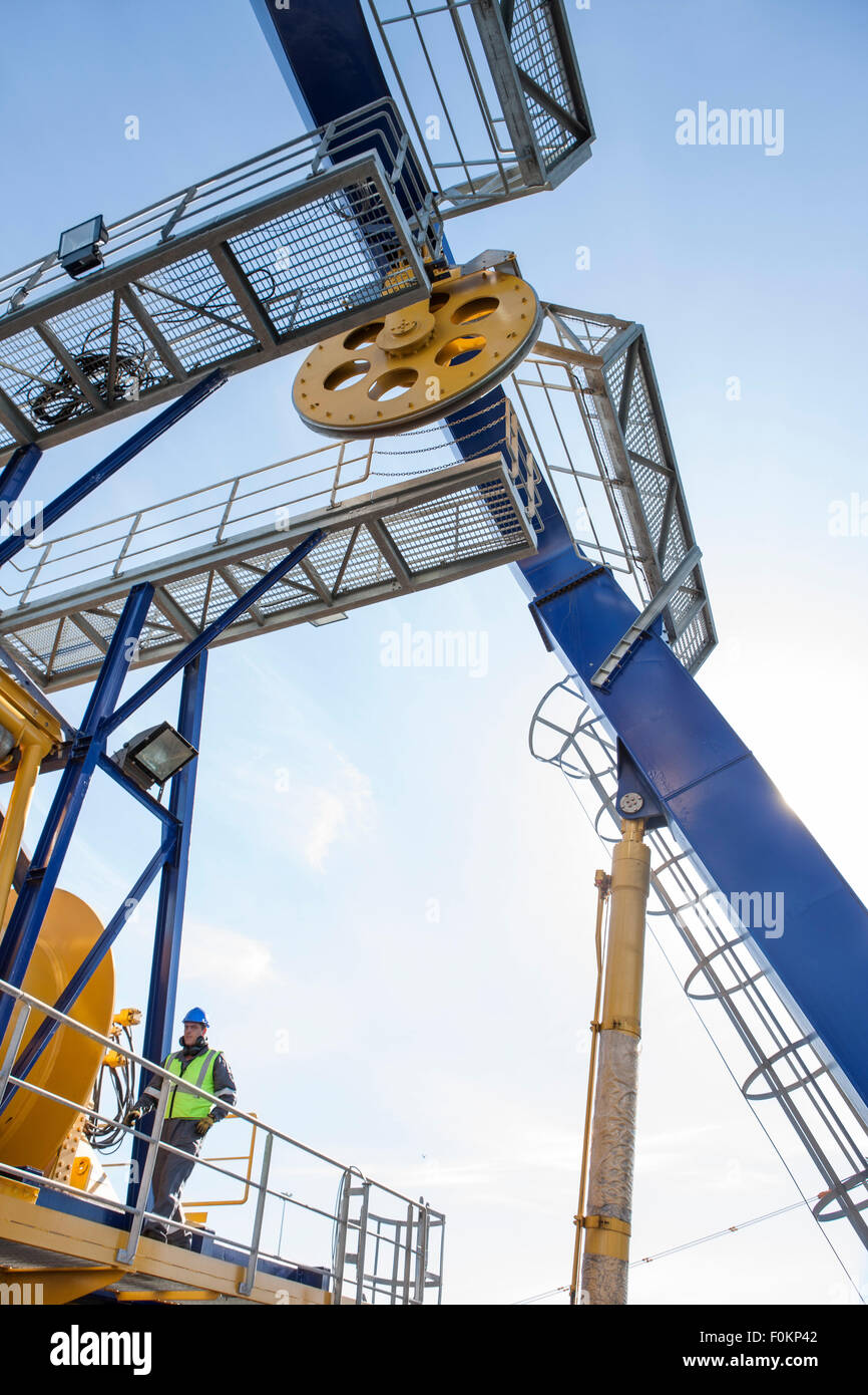 Man working onboard a ship Stock Photo - Alamy