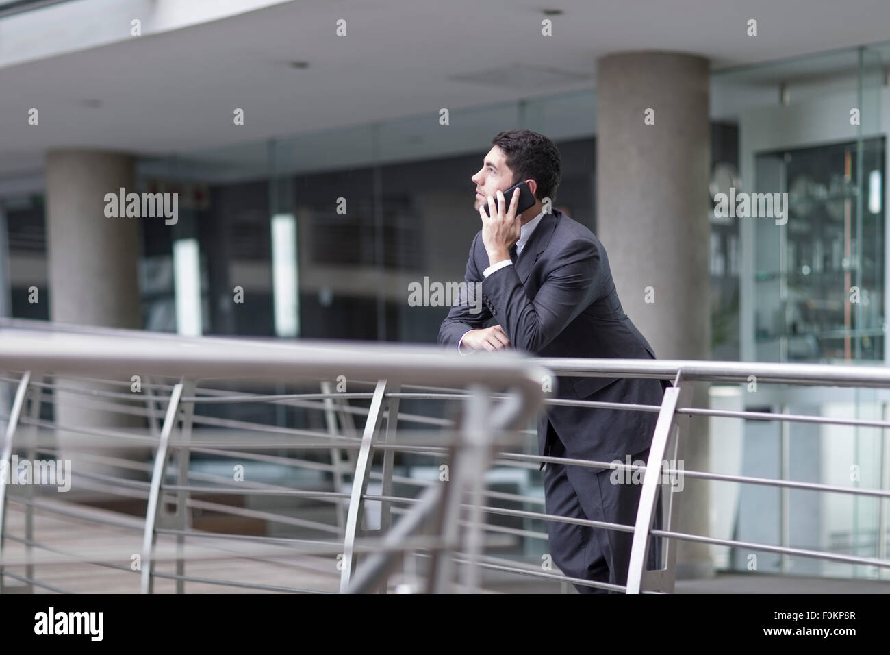 Businessman telephoning with smartphone Stock Photo - Alamy