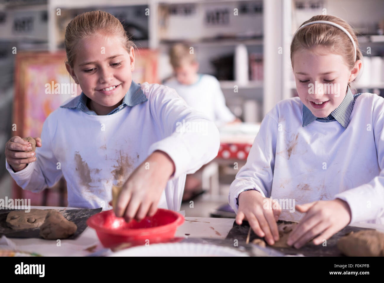 Female student working on clay hi-res stock photography and images - Alamy