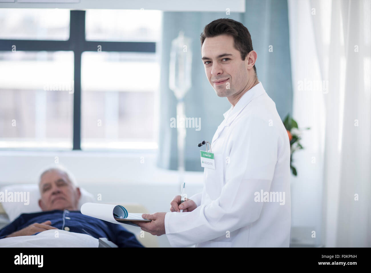 Portrait of a doctor in a hospital room Stock Photo - Alamy
