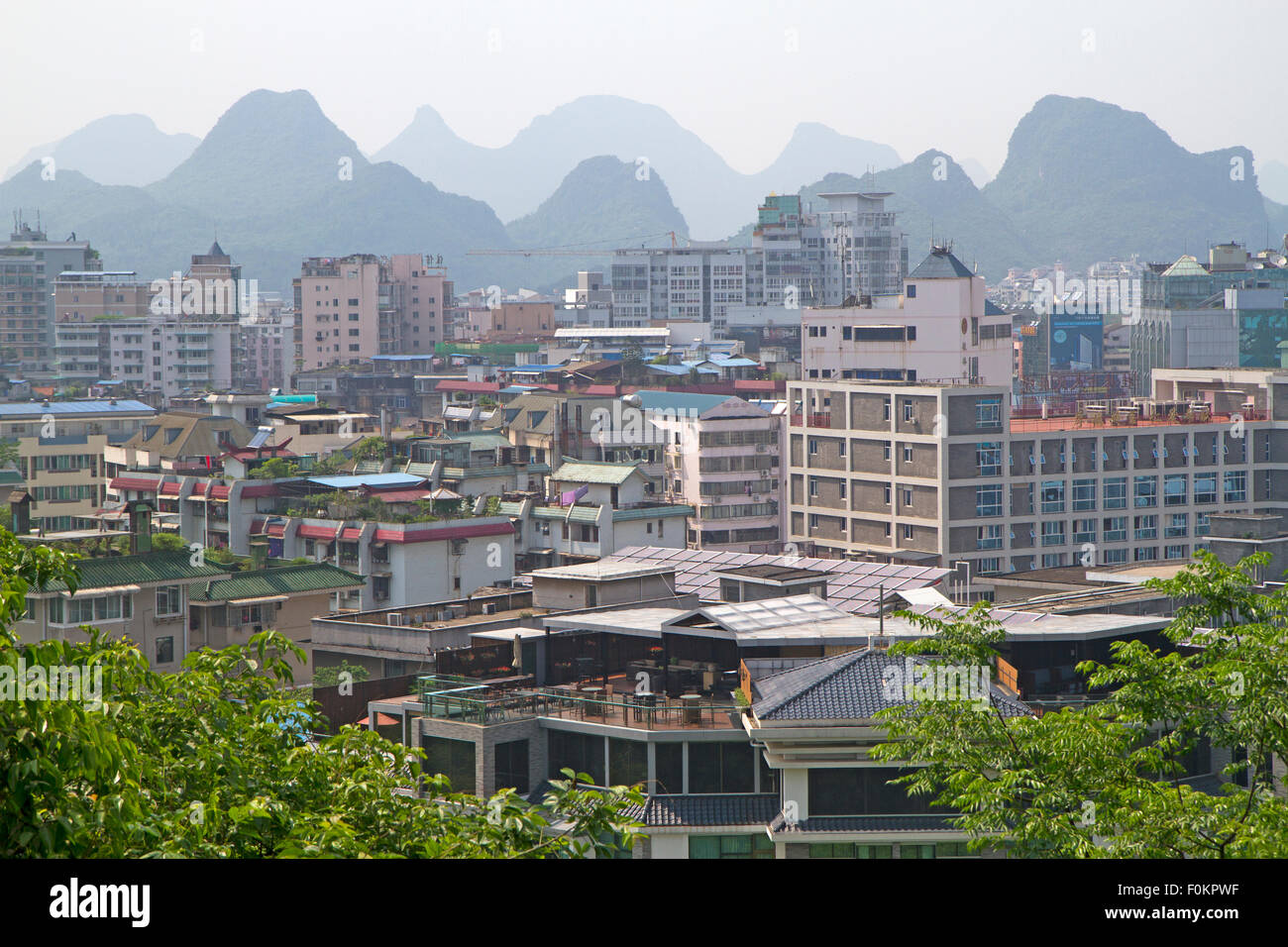 Rooftops and limestone peaks in Guilin Stock Photo - Alamy