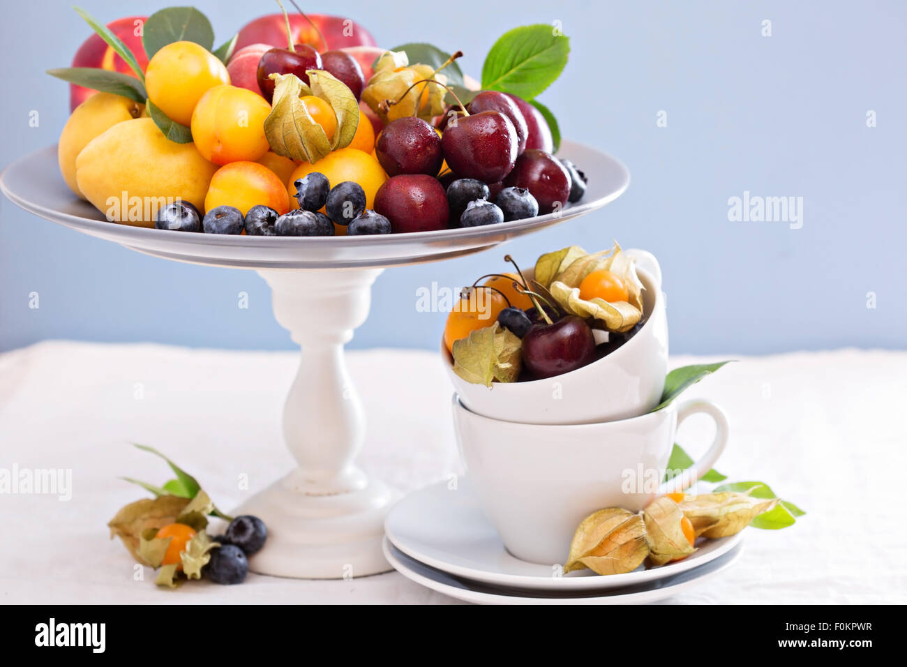 Whole half stone fruits hi-res stock photography and images - Alamy