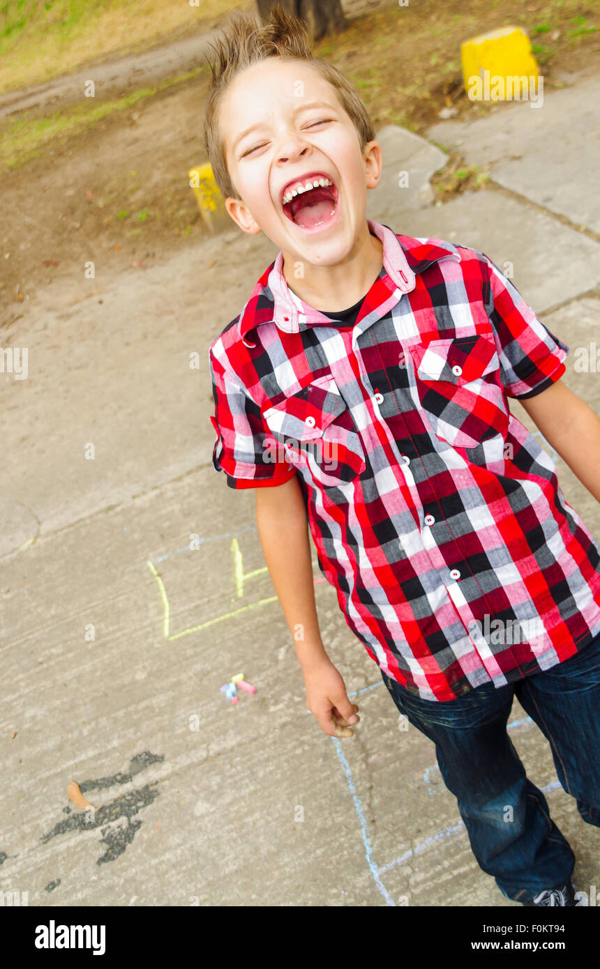 cute boy playing hopscotch Stock Photo - Alamy