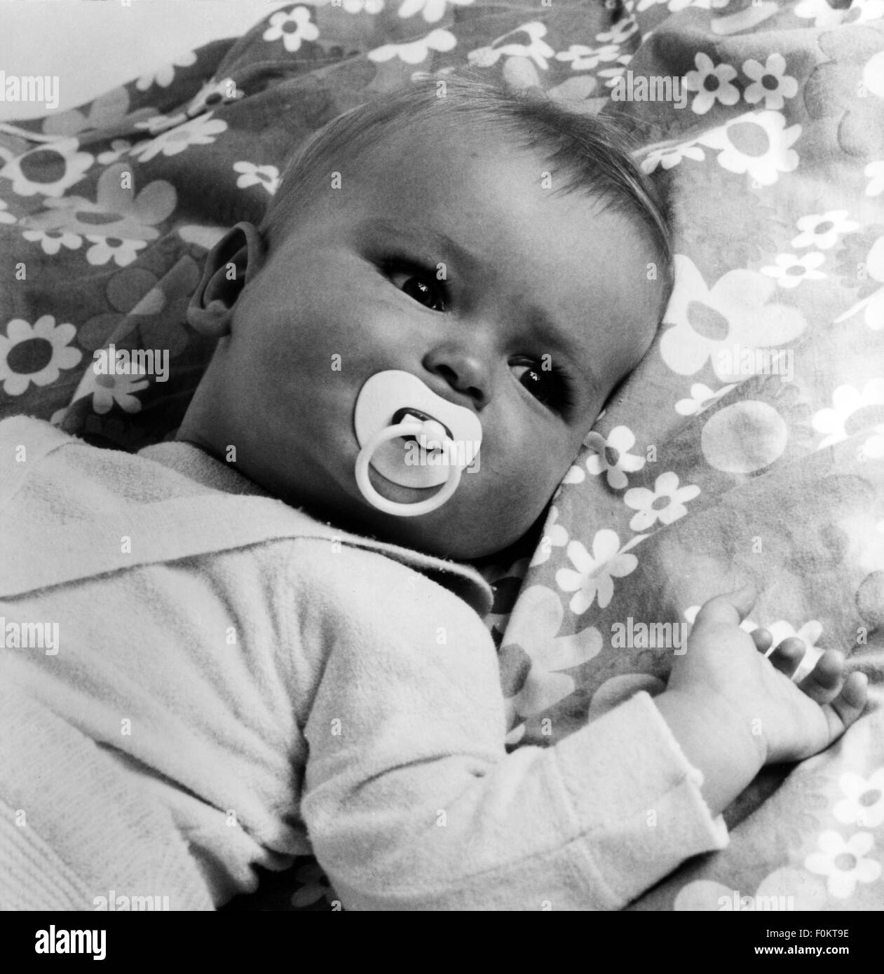 Babies pacifier Black and White Stock Photos & Images - Alamy