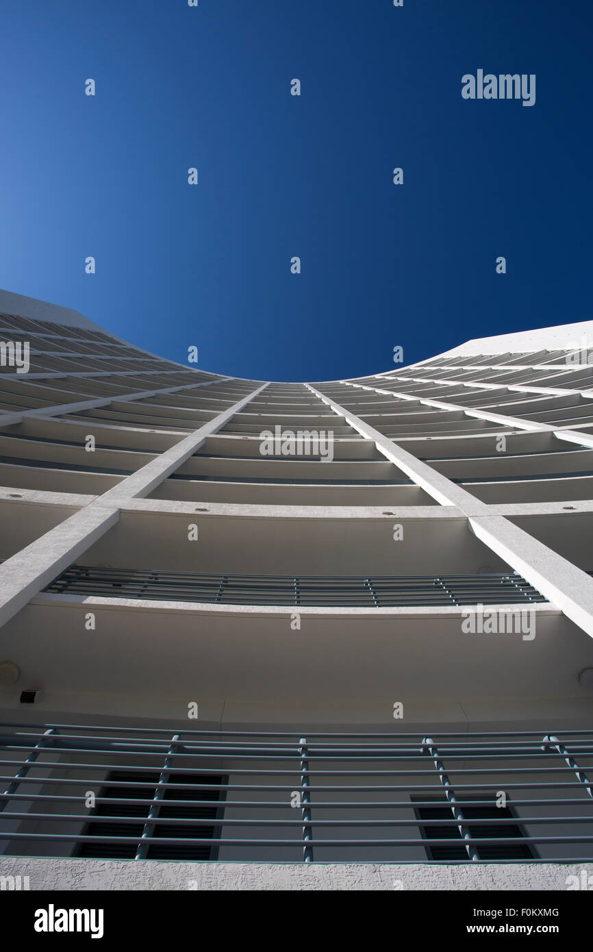 High residential building in Miami with blue sky with the railing ...