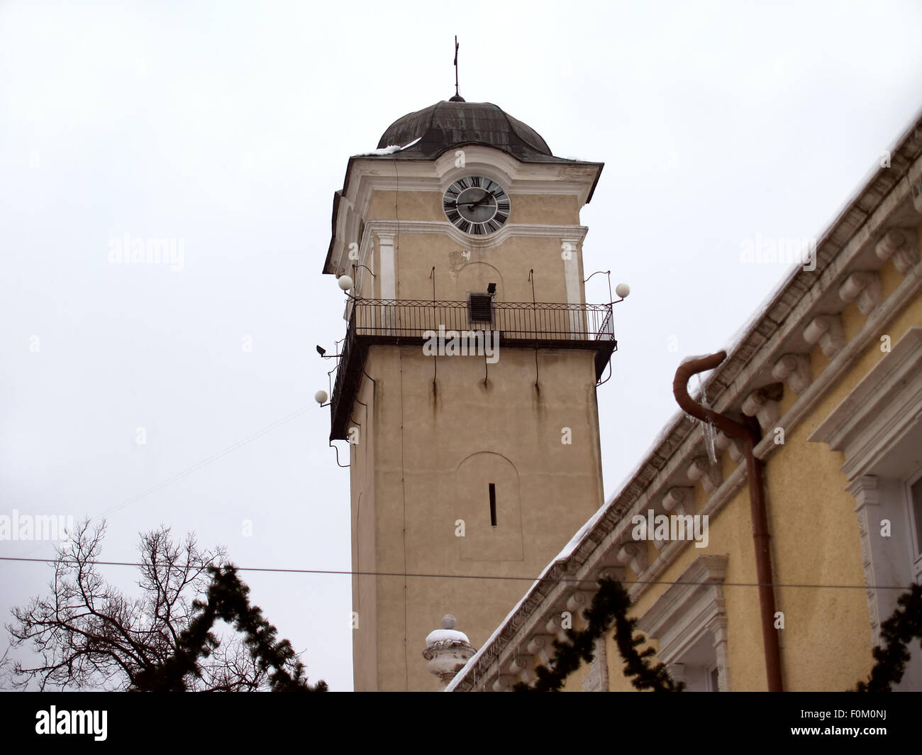 Town hall clock in town Poprad in Slovakia in winter Stock Photo - Alamy