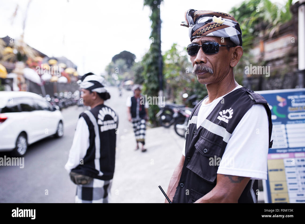 Balinese security guards Pecalang, Bali Stock Photo - Alamy
