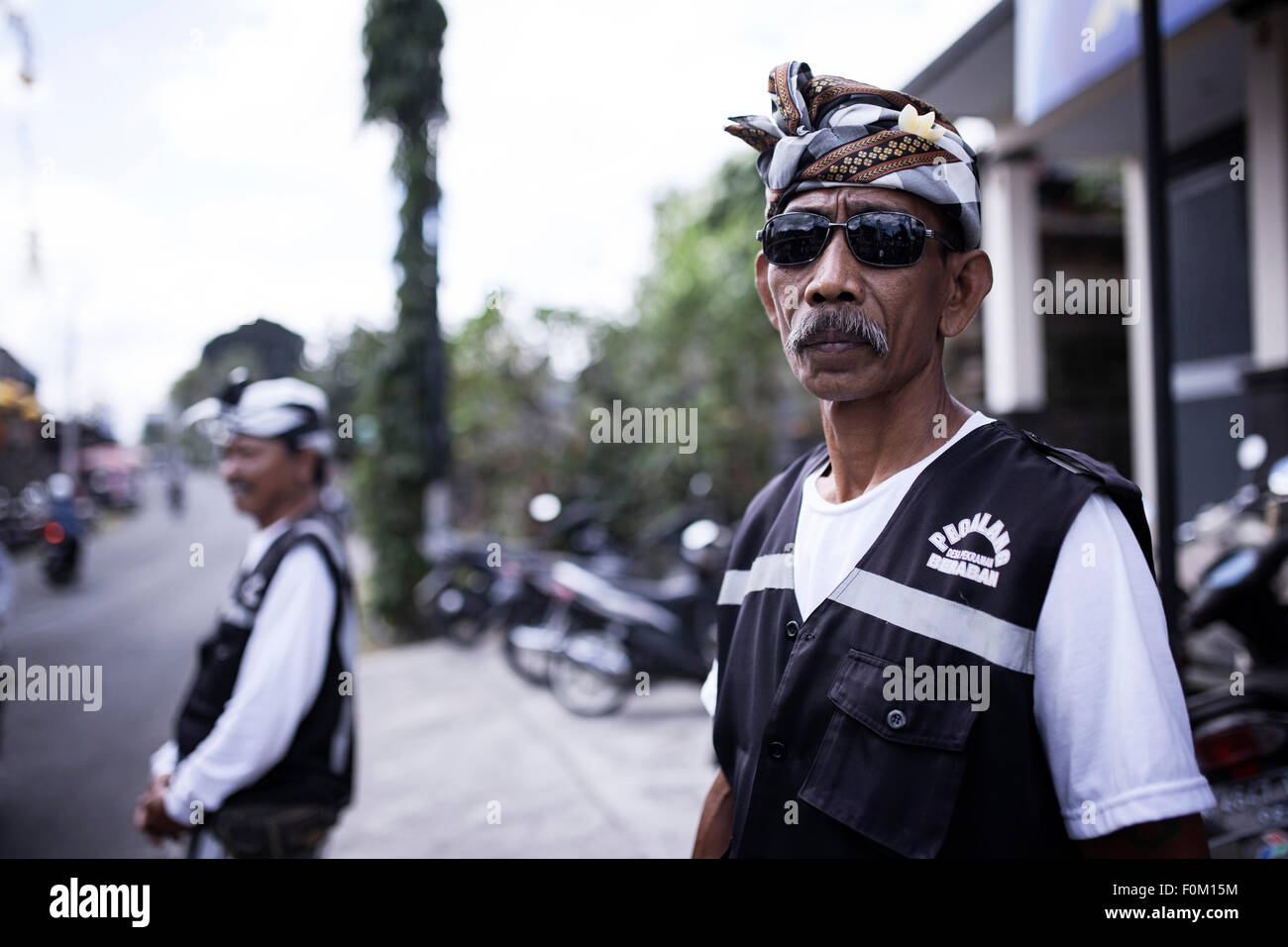 Balinese security guards Pecalang, Bali Stock Photo - Alamy