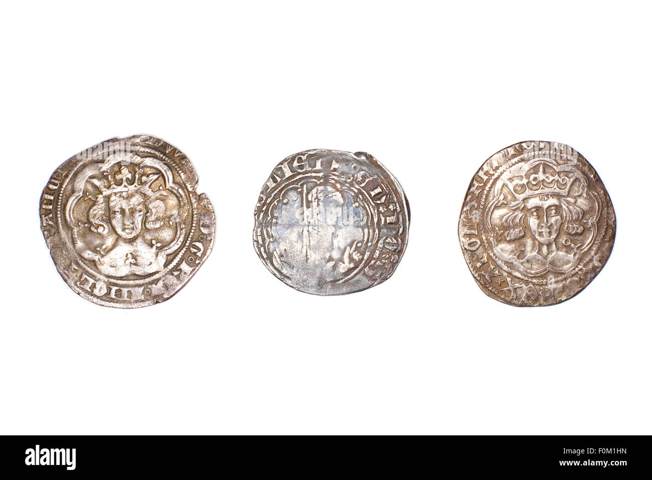 A lot of old coins with portraits of kings on a white background Stock ...