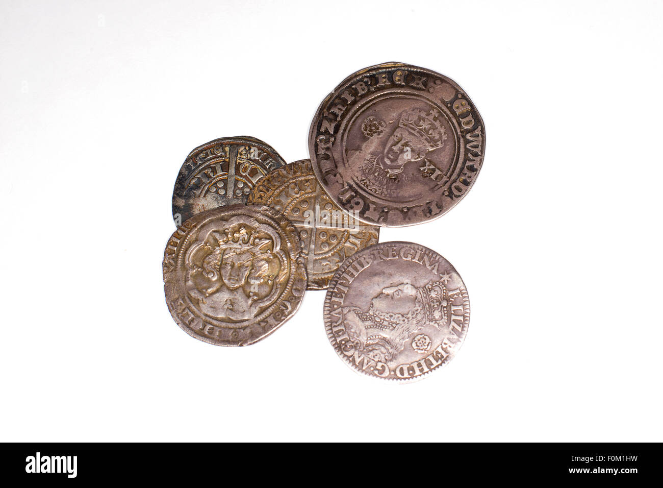 A lot of old coins with portraits of kings on a white background Stock ...