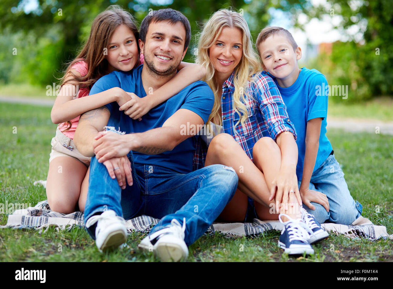 Parents embracing teenager hi-res stock photography and images - Alamy